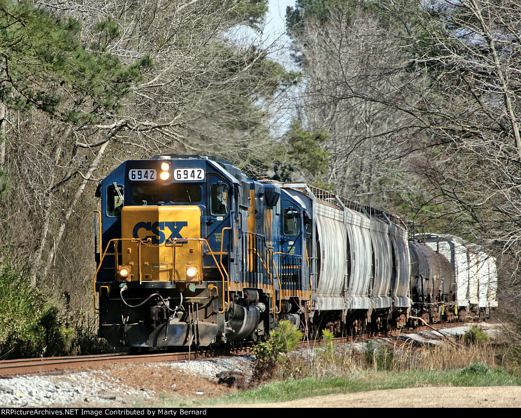 CSX 6942 and 2305 East of Town
